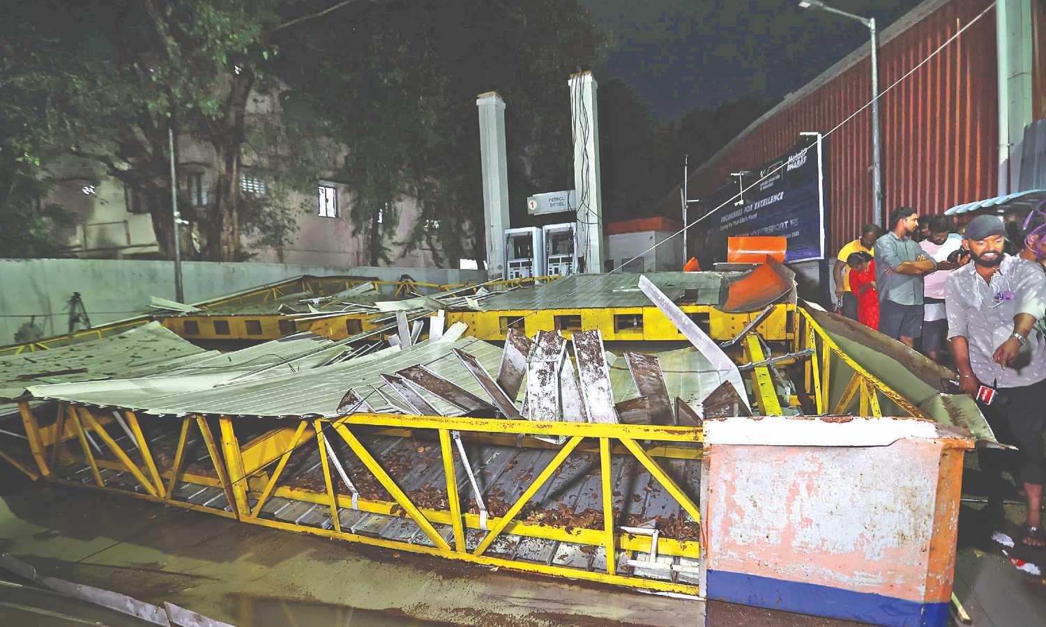 Petrol bunk’s metal roof collapses in Saidapet after rains; one dead ...