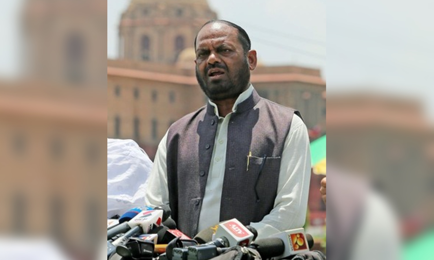 Veteran Gujarat Congress leader Naran Rathwa and son join BJP