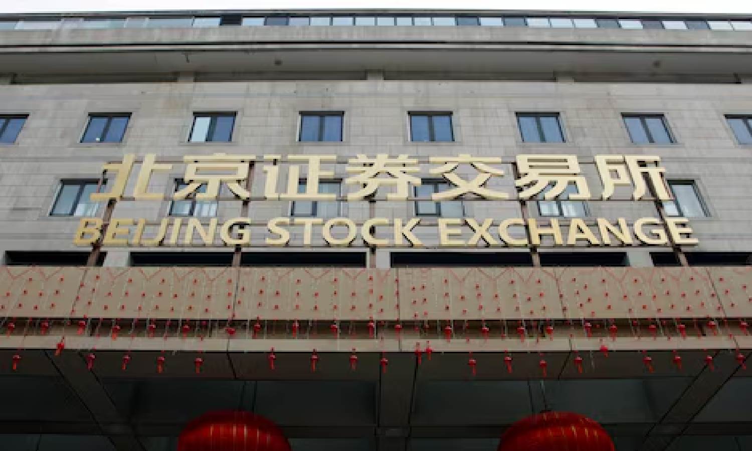 China shares jump, Japan tumbles with yen pinned near intervention zone