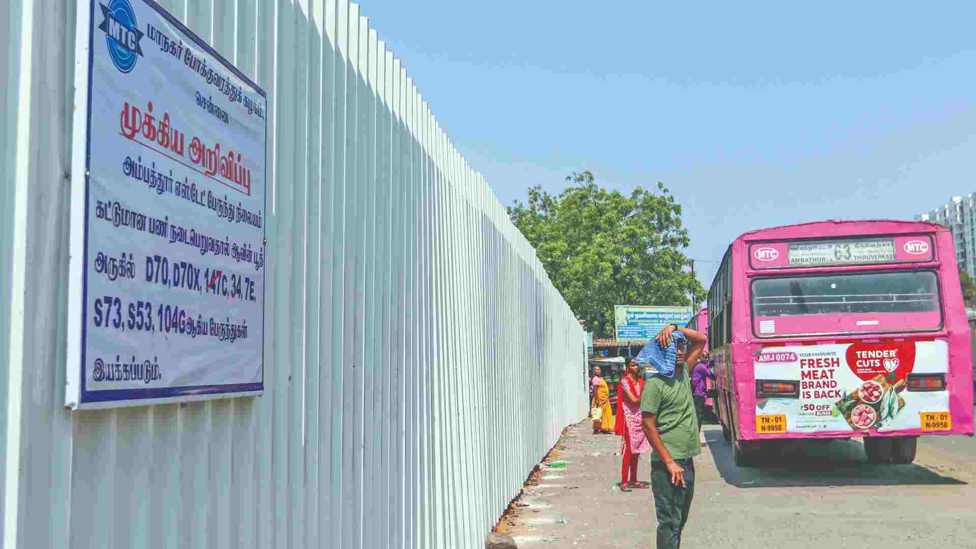 Passengers suffer under searing heat without bus shelter at Ambattur IE