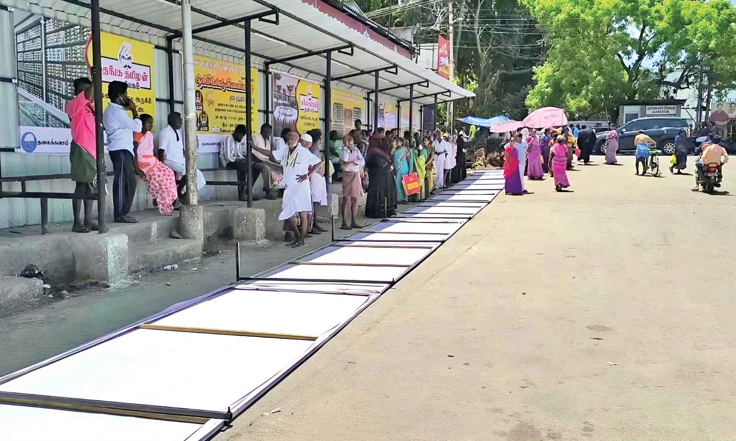 Narrow escape for public as wind blows off 100-ft long digital hoarding ...