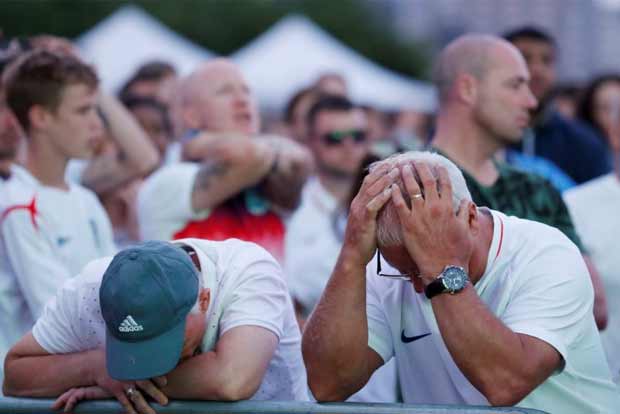 Hopes dashed, England fans taste bitter defeat once again