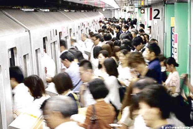 Overworked Japan mulls four-day week