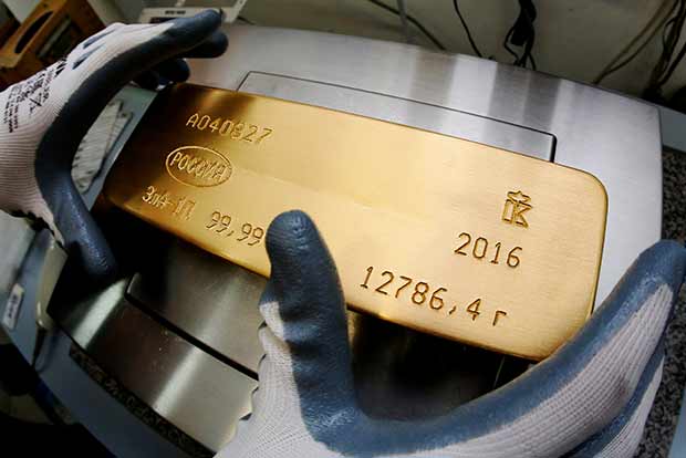 Gold prices turn lower on shrinking demand