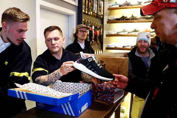 Serpentine queues in Berlin to buy sneakers that double up as transport ...